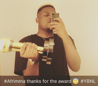 Olamide flaunts massive leg tattoo • ErockCity.com